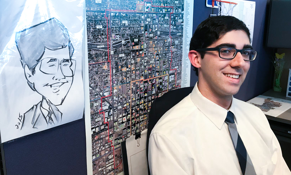 Phoenix research director credits success through childhood travels